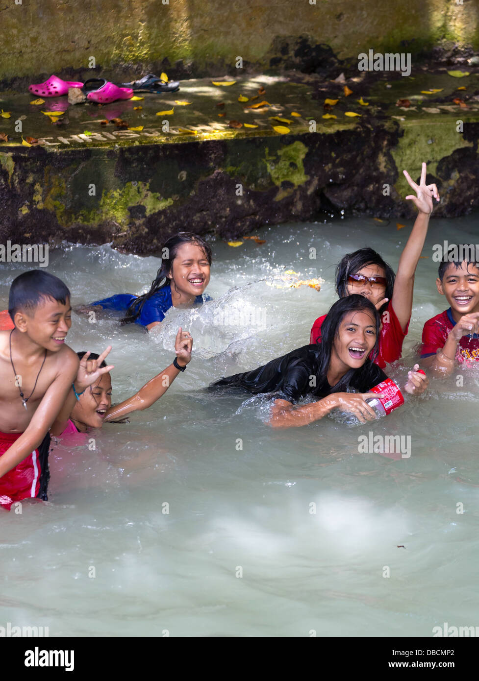 Young local Children enjoying a Bath in a Pool in Tagbilaran on Bohol ...