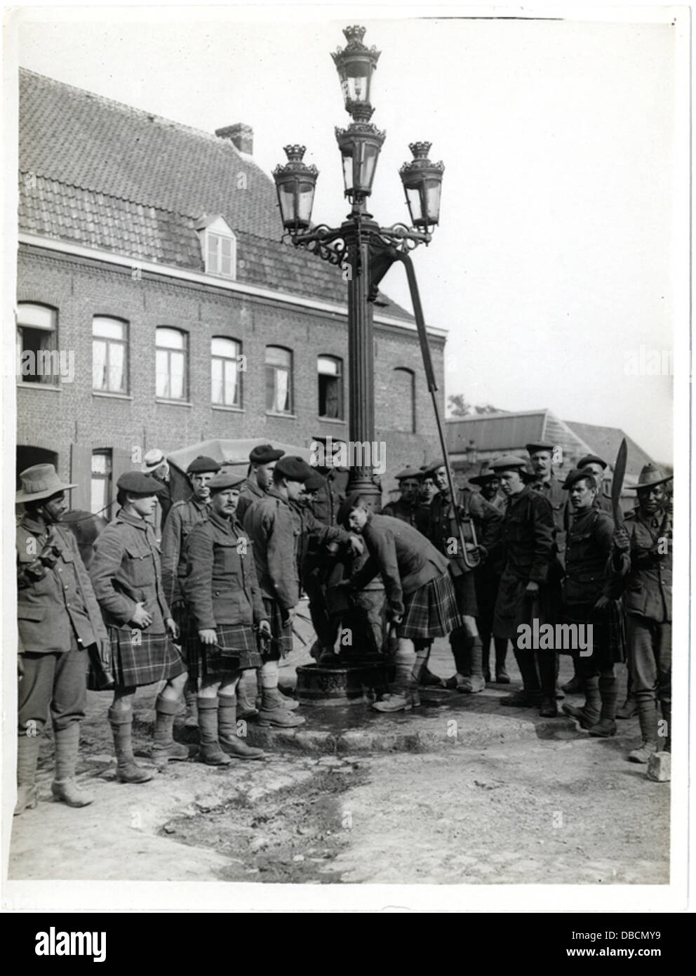 This photograph depicts a traditional town pump, a key feature of rural ...