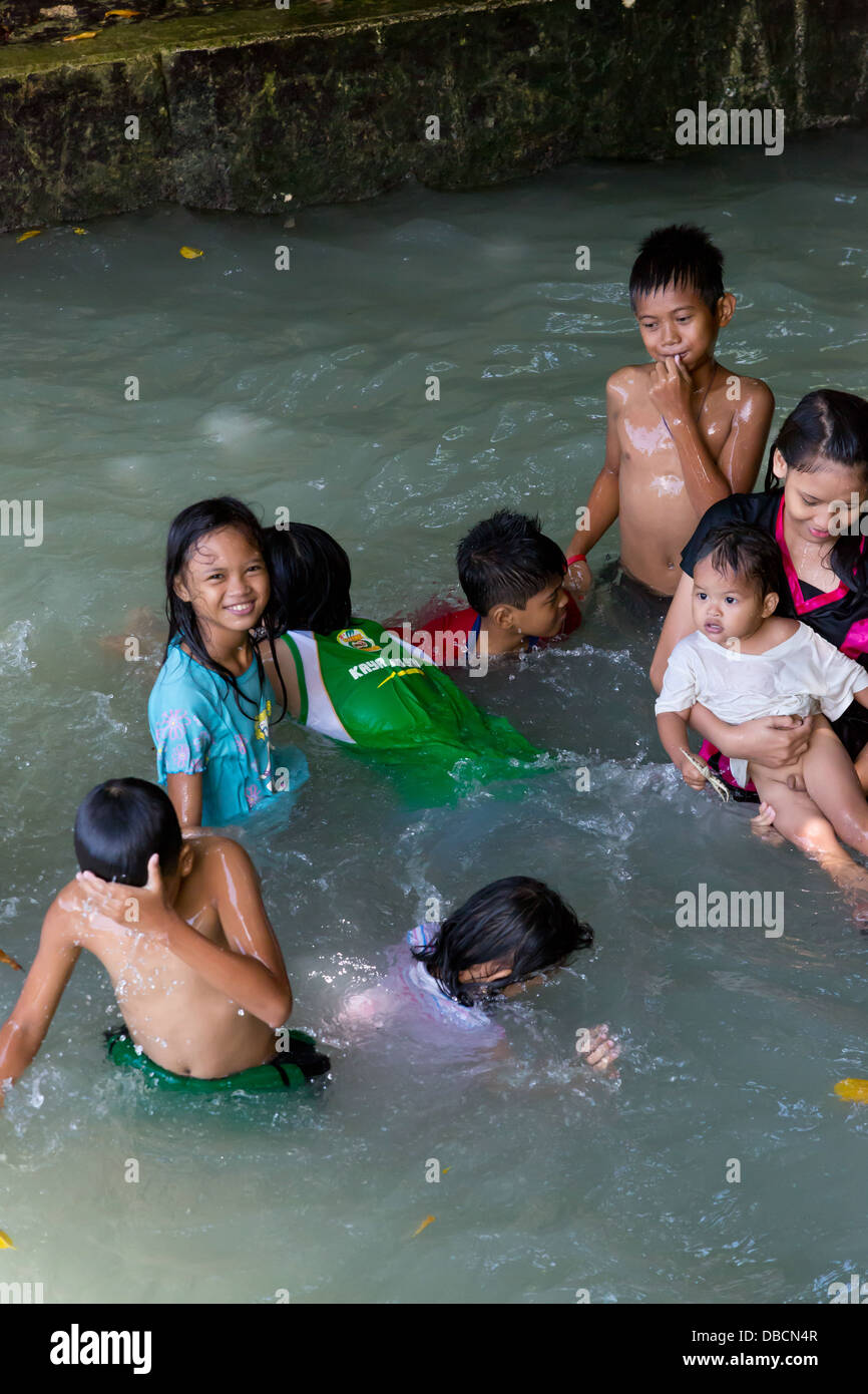 Young local Children enjoying a Bath in a Pool in Tagbilaran on Bohol ...