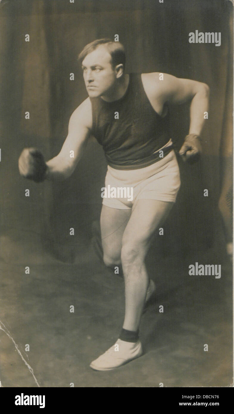 This is a photograph of Tommy Burns, a boxer in the early 20th century ...
