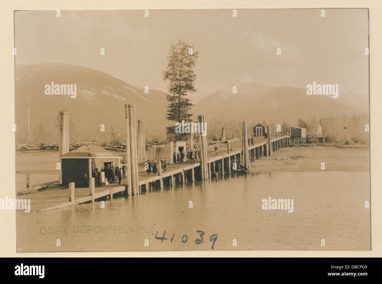 The image depicts the wharf at Burton, a community located in British ...