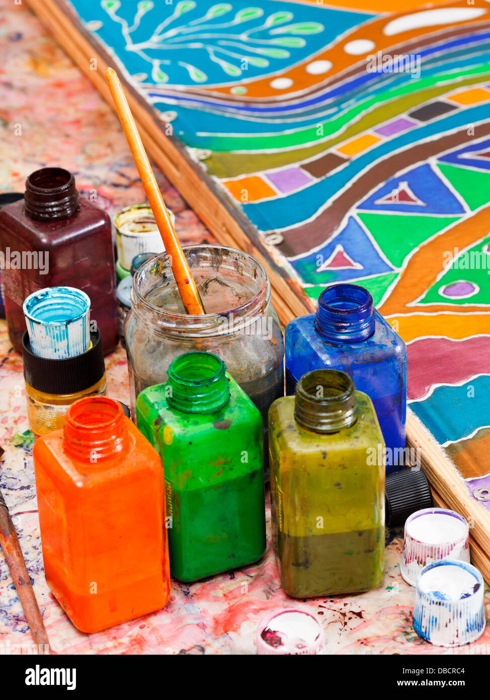 paintbrushes and bottles with pigments for cold batik Stock Photo - Alamy