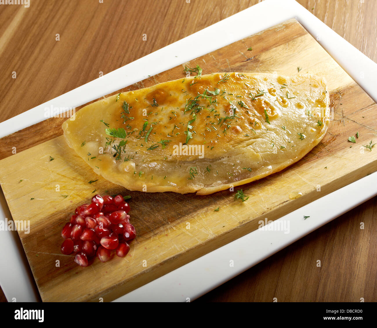 Qutab- baked Chebureki traditional georgian meat pastry.meat in a pitta ...