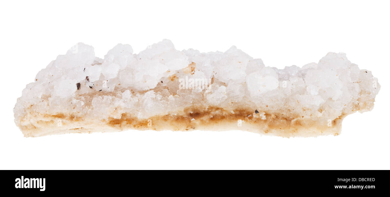 crust of sea salt from Dead Sea close up isolated on white background ...