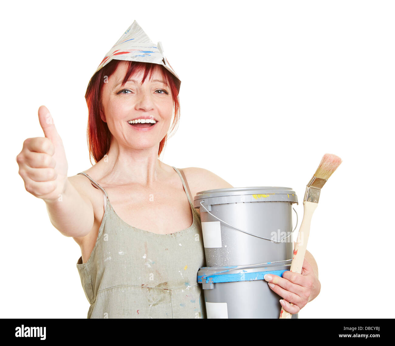 Happy painter with paint and brushes holding thumbs up Stock Photo - Alamy