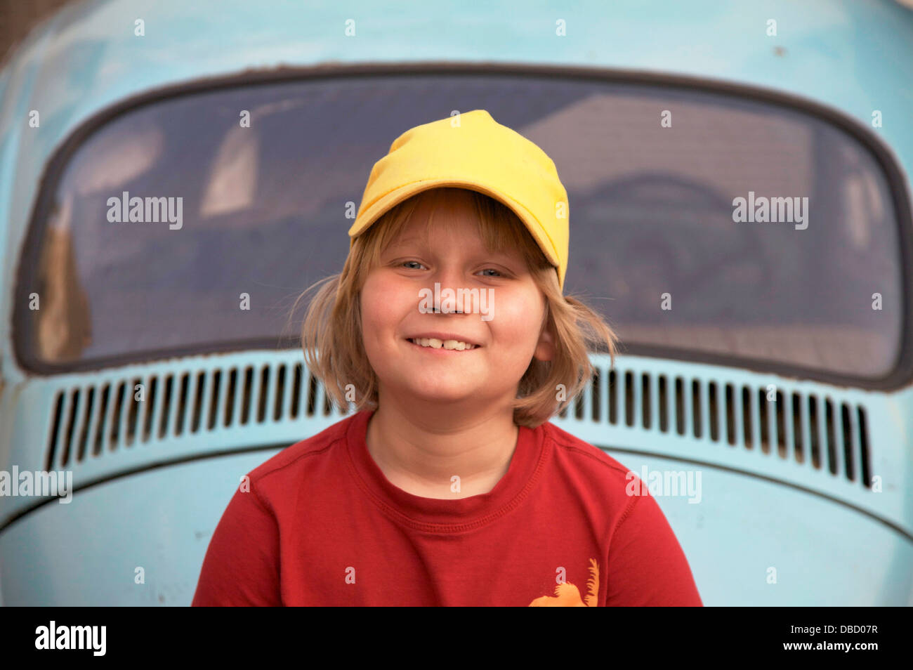 boy in front of VW beetle Stock Photo - Alamy
