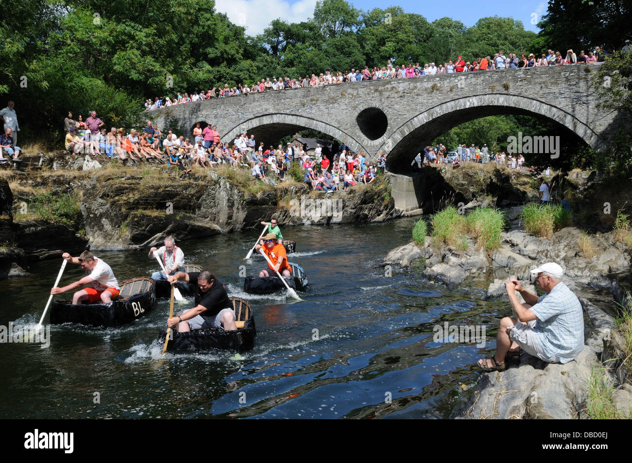 Coracle men competing in a coracle cwrwgl race on the Teifi River at ...