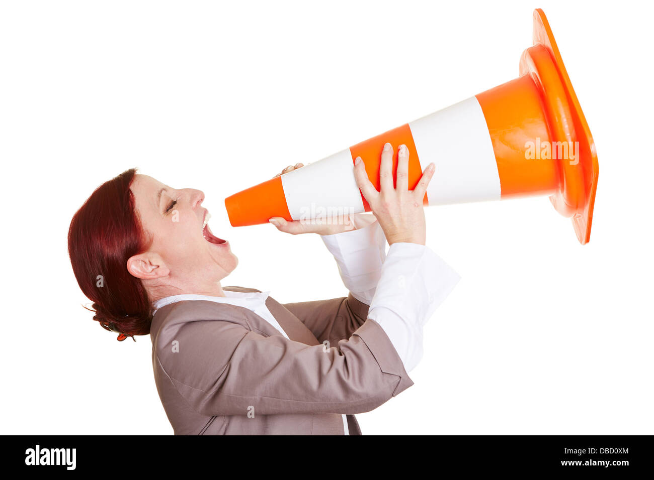 Angry business woman shouting in a big traffic cone Stock Photo - Alamy
