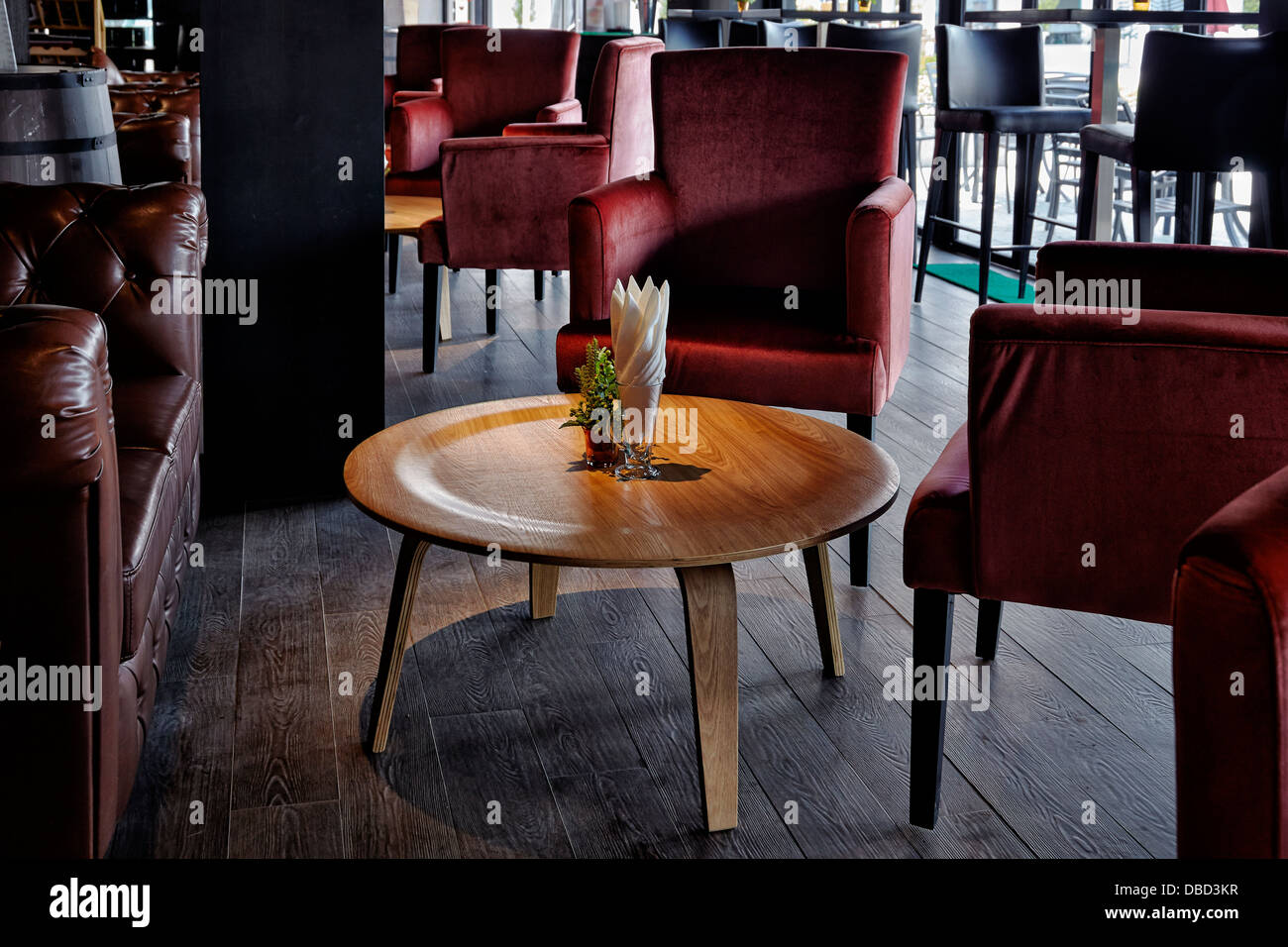Modern restaurant interior and lounge area with plush soft furnishing ...