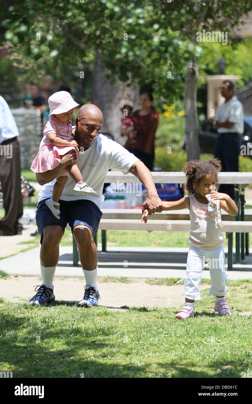 Byron Allen and his wife, Jennifer Lucas enjoy the day playing at ...