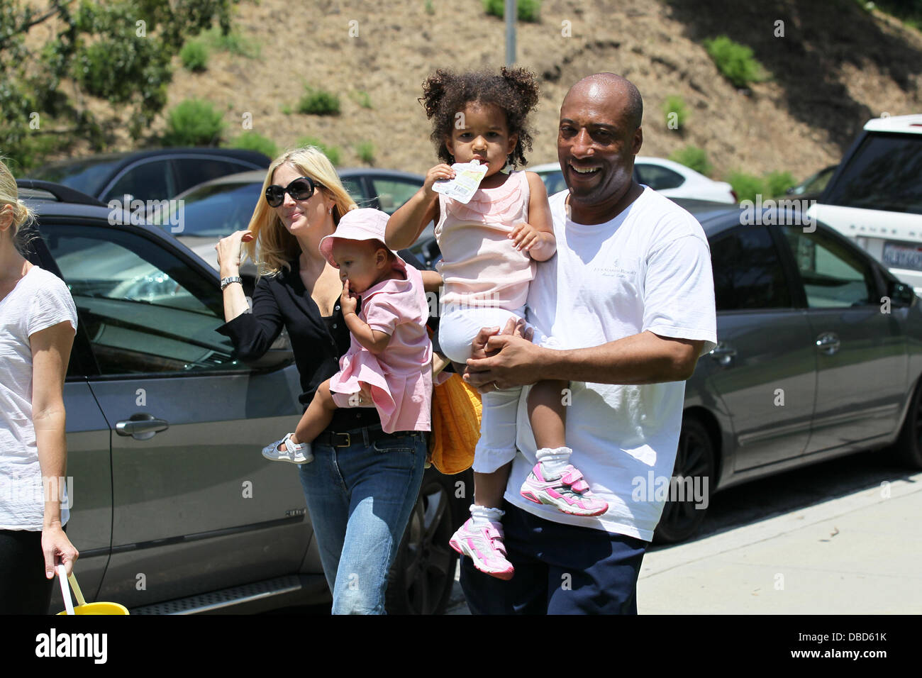 Byron Allen and his wife, Jennifer Lucas enjoy the day playing at ...