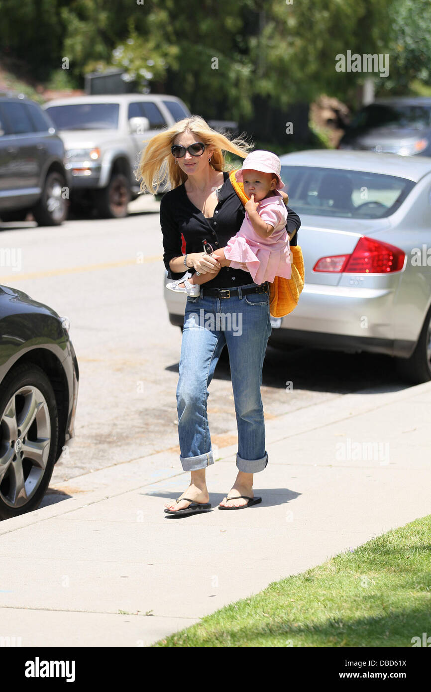 Byron Allen and his wife, Jennifer Lucas enjoy the day playing at ...