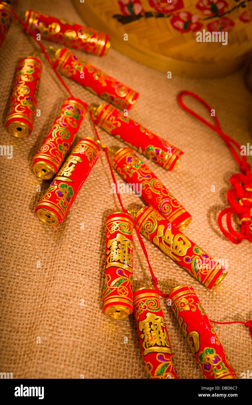 Traditional chinese new year fire crackers on the red Stock Photo - Alamy