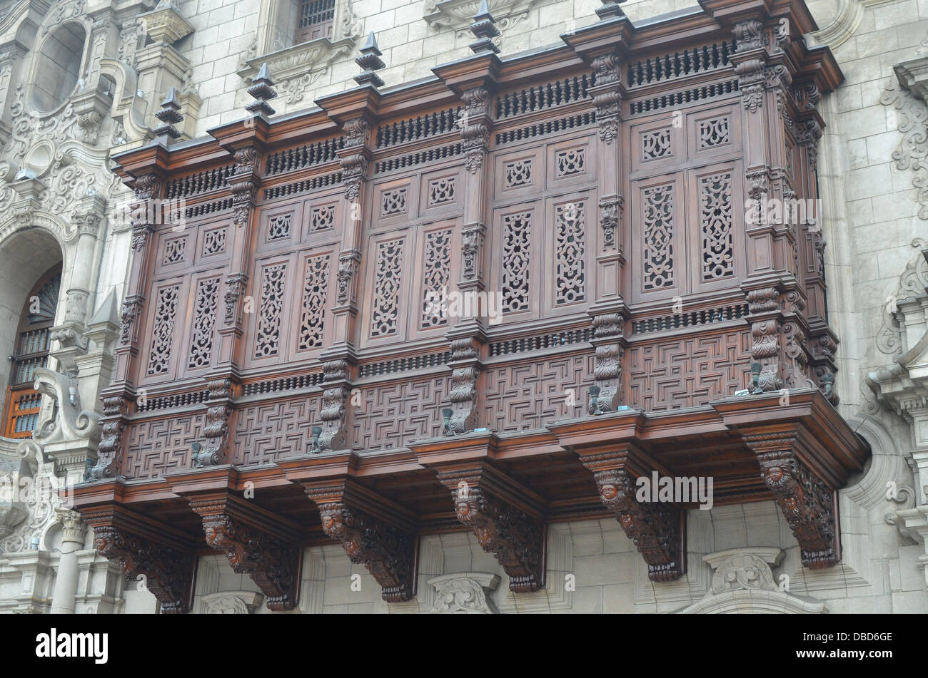Elaborately carved wooden balconies in the Spanish colonial Plaza de ...