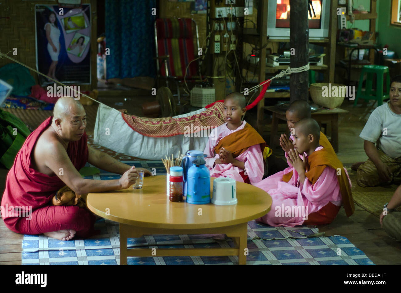 Monk talking to nuns Northern Shan province Stock Photo - Alamy
