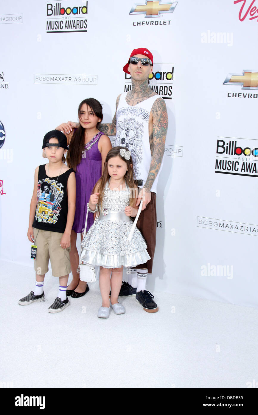 Travis Baker, children at the 2011 Billboard Music Awards at MGM Grand ...