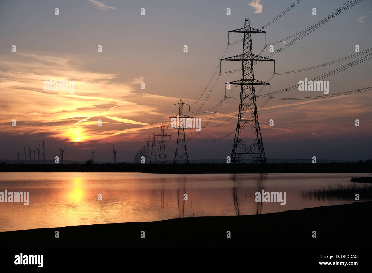 Pylons at sunset Stock Photo - Alamy