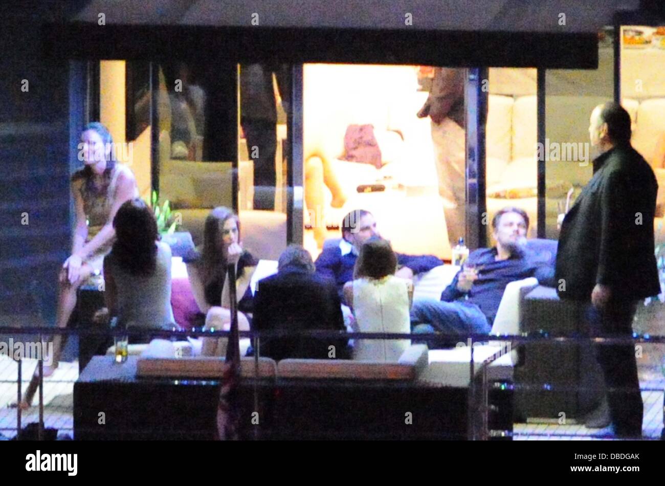 Leonardo DiCaprio relaxes with friends while cruising on a yacht in ...