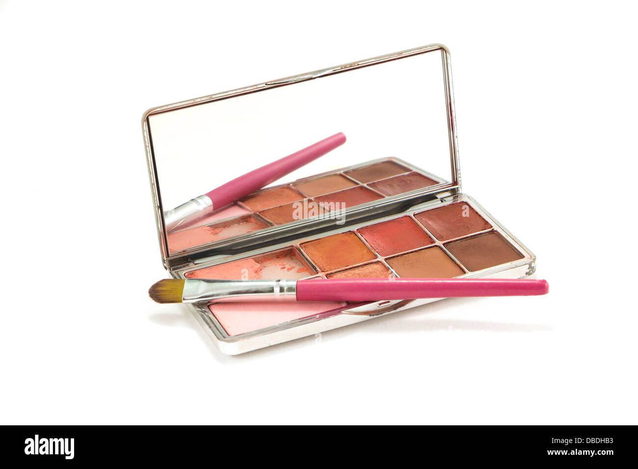used lip palette and pink brush on white background Stock Photo - Alamy