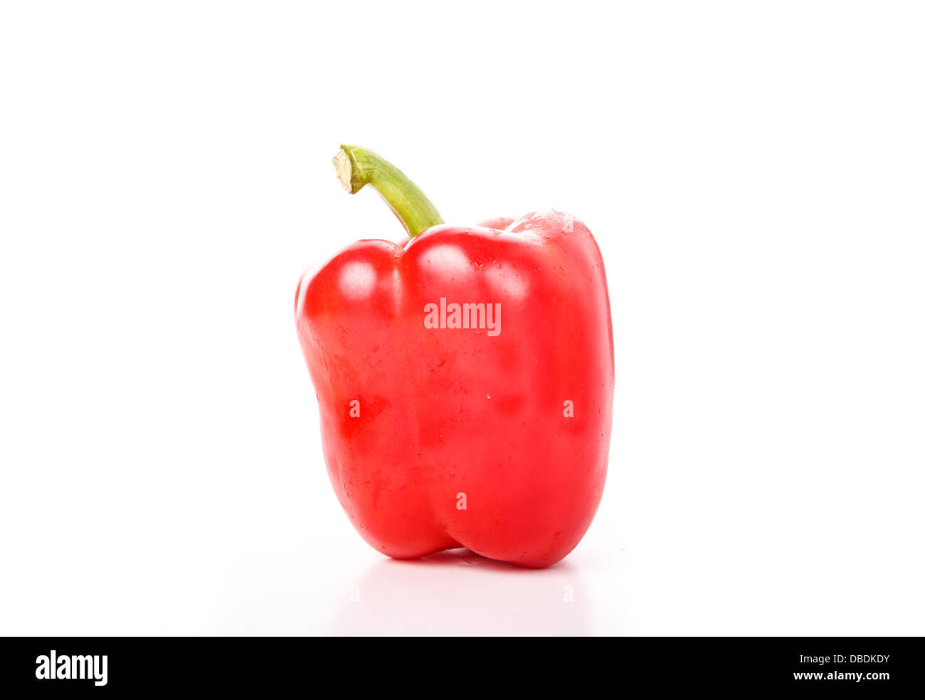 A red, ripe, bell pepper on a white background Stock Photo - Alamy
