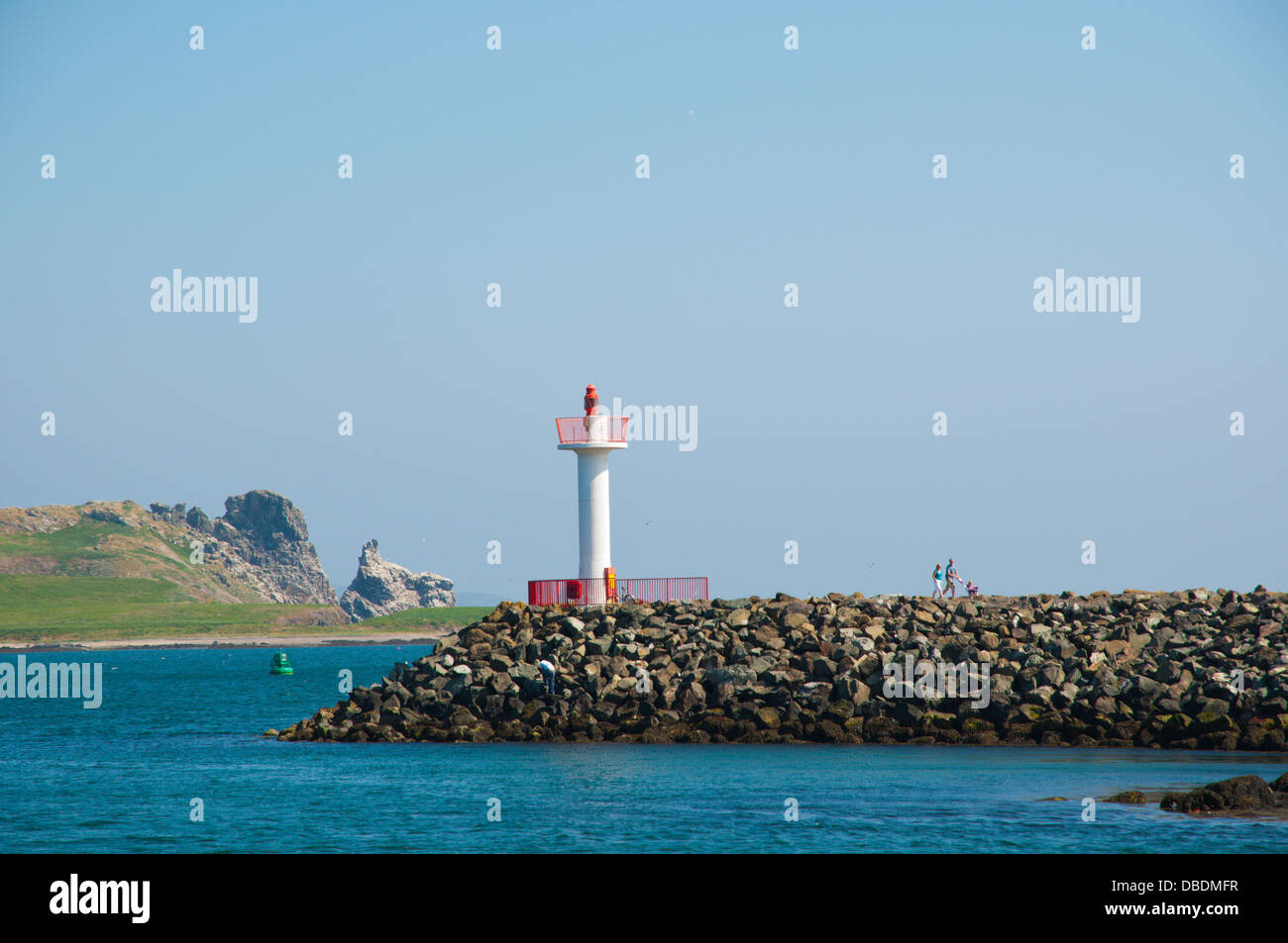 Lighthouse on East Pier breakwater Howth peninsula near Dublin Ireland ...