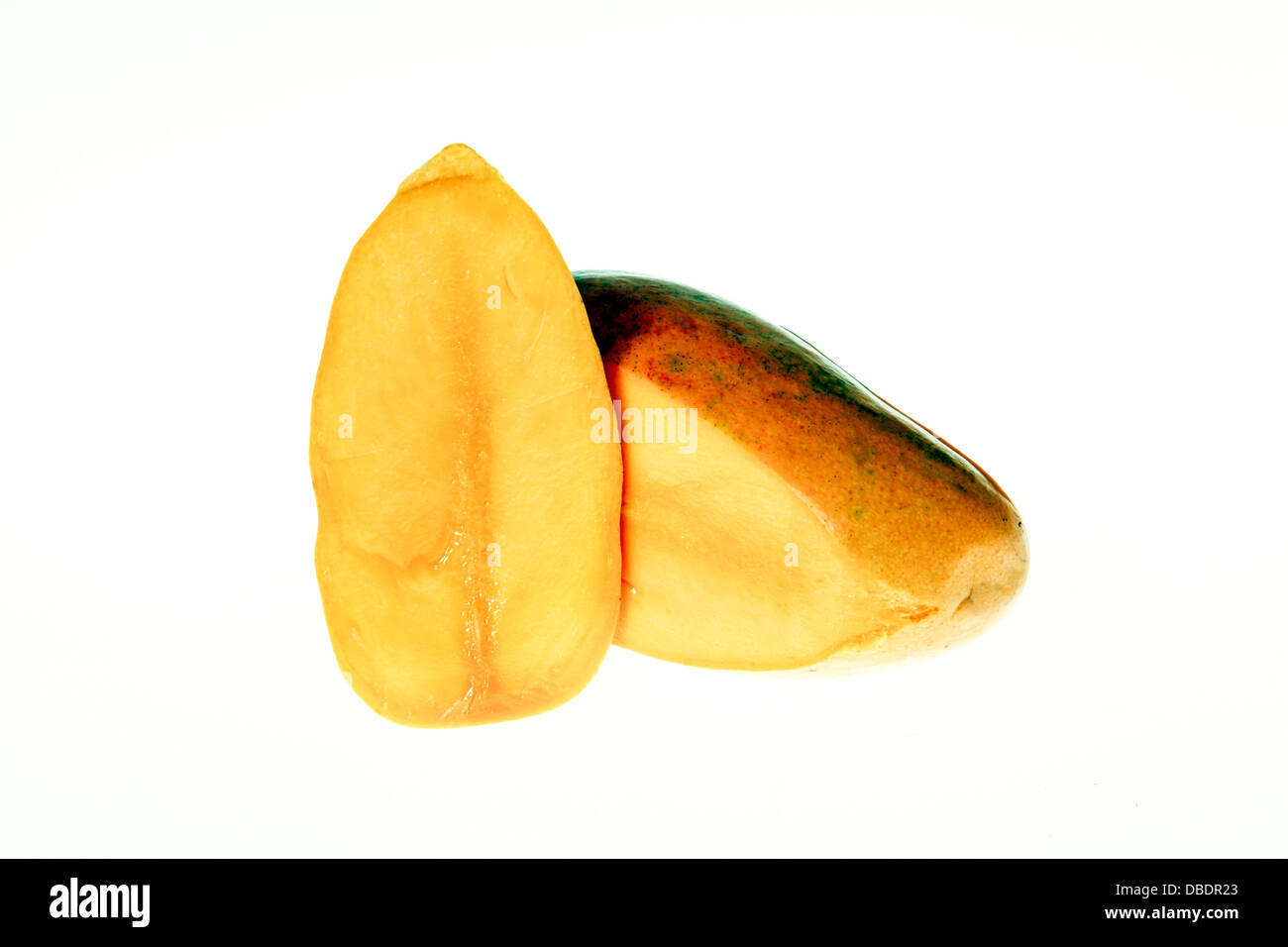 Halved mango hi-res stock photography and images - Alamy