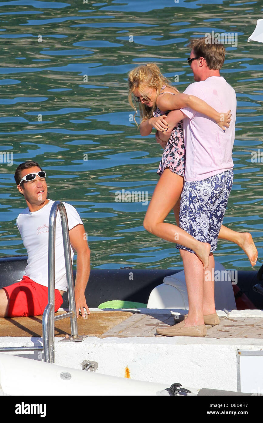 Geri Halliwell and Henry Beckwith relax by the water after attending ...