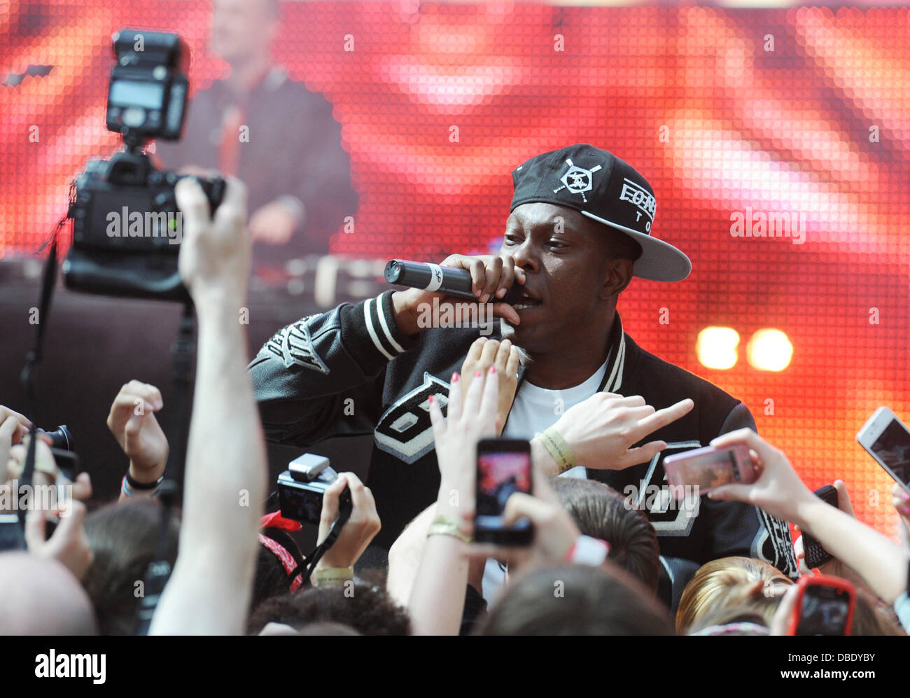 Dizzee Rascal performing at the "Coca- Cola London 2012 Olympic Torch ...
