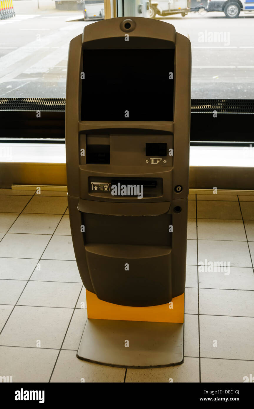 Kiosk for self service check in at the airport Stock Photo - Alamy