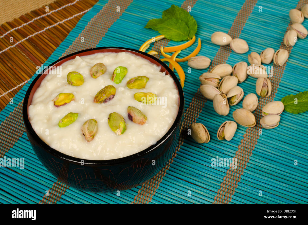 Indian rice pudding with pistachios, a traditional dessert Stock Photo ...