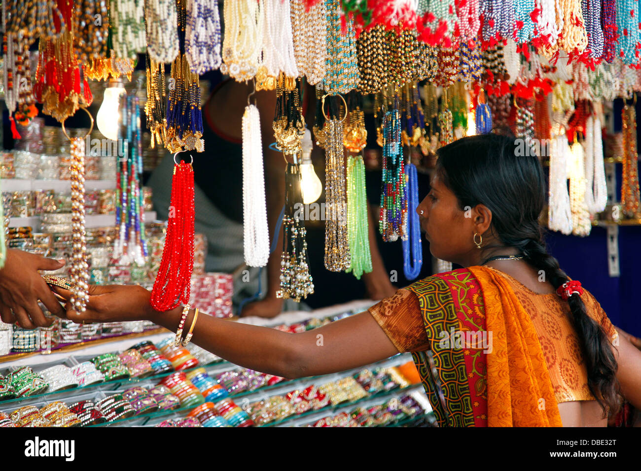 Women buying bangles at Jewelery stall Stock Photo - Alamy
