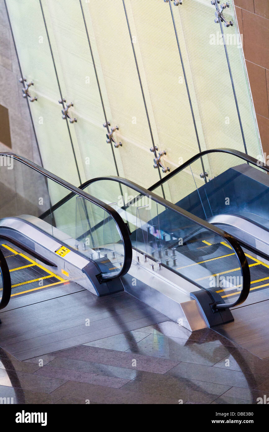 Escalator in modern building Stock Photo - Alamy