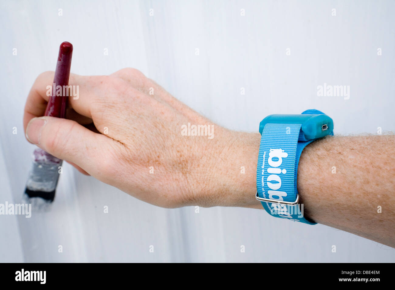 An Activity Monitor being worn on the wrist of person carrying out an ...