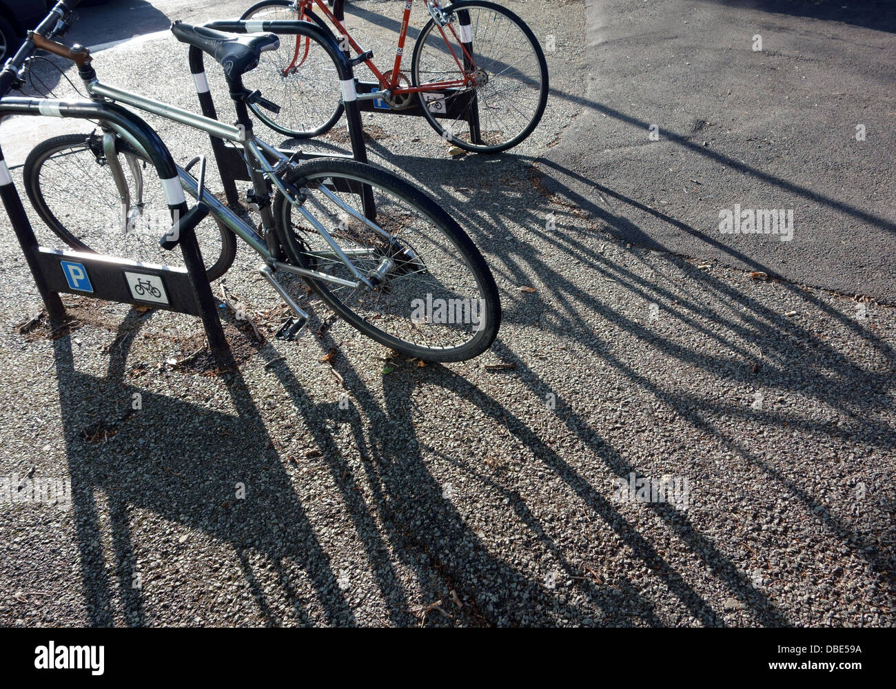 Bikes attached to a cycle rack in South London Stock Photo - Alamy
