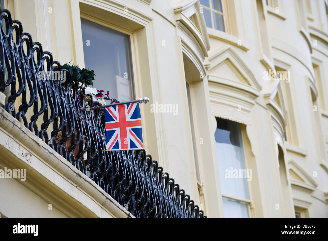 Regency architecture houses with balconies and Union Jack flag at ...