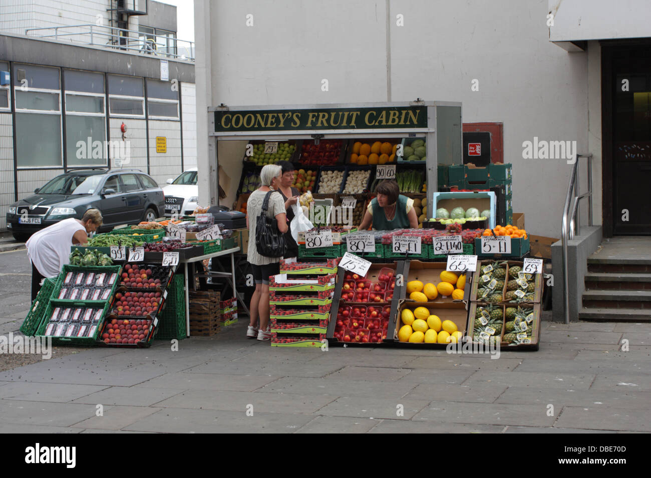 Cooney's Fruit Cabin. Ladies at a fruit and veg stall outside Cassaton ...