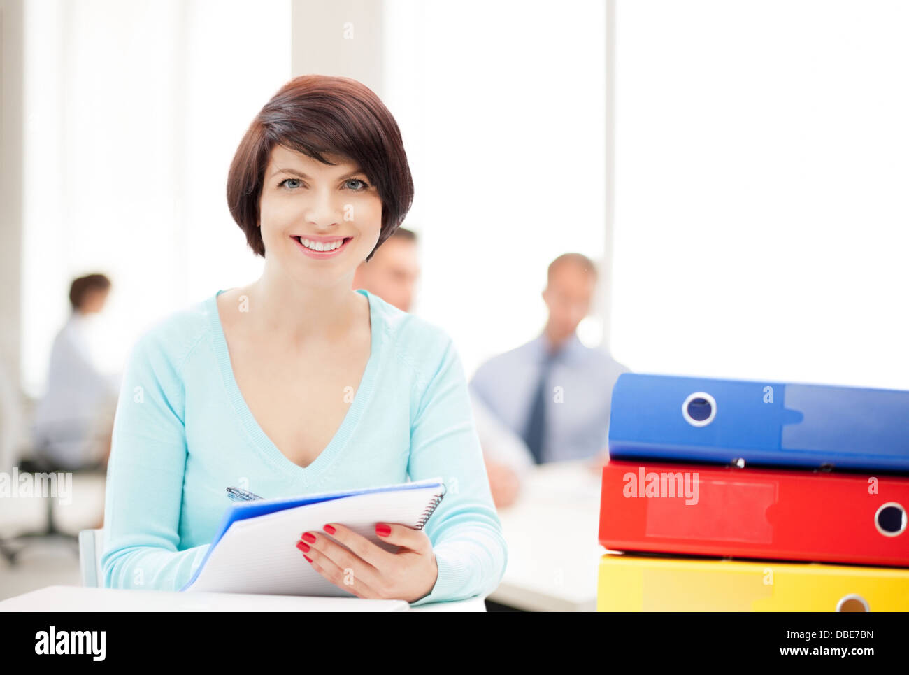 woman with folders Stock Photo - Alamy