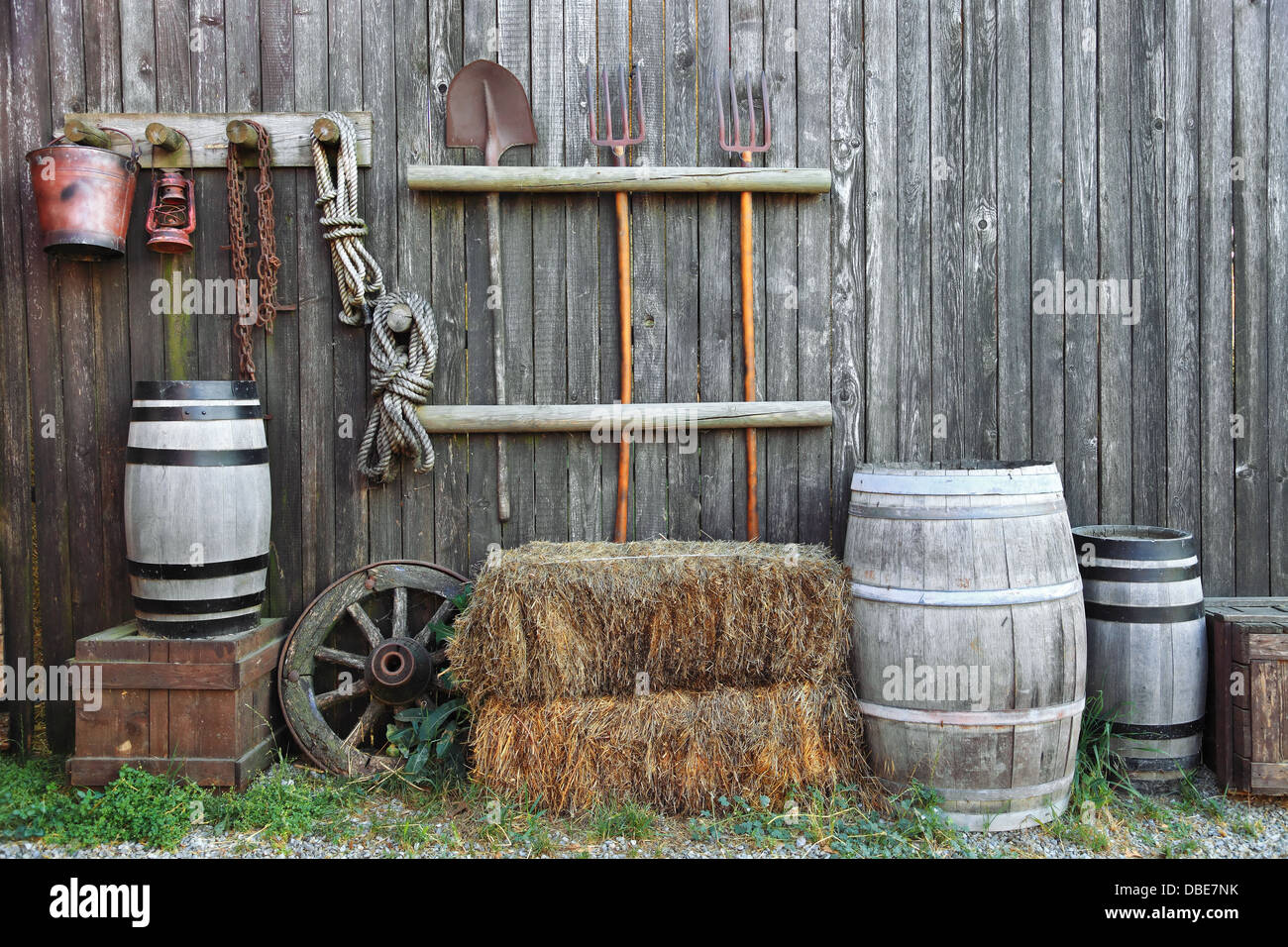 Barrel bale and fork in old barn Stock Photo - Alamy