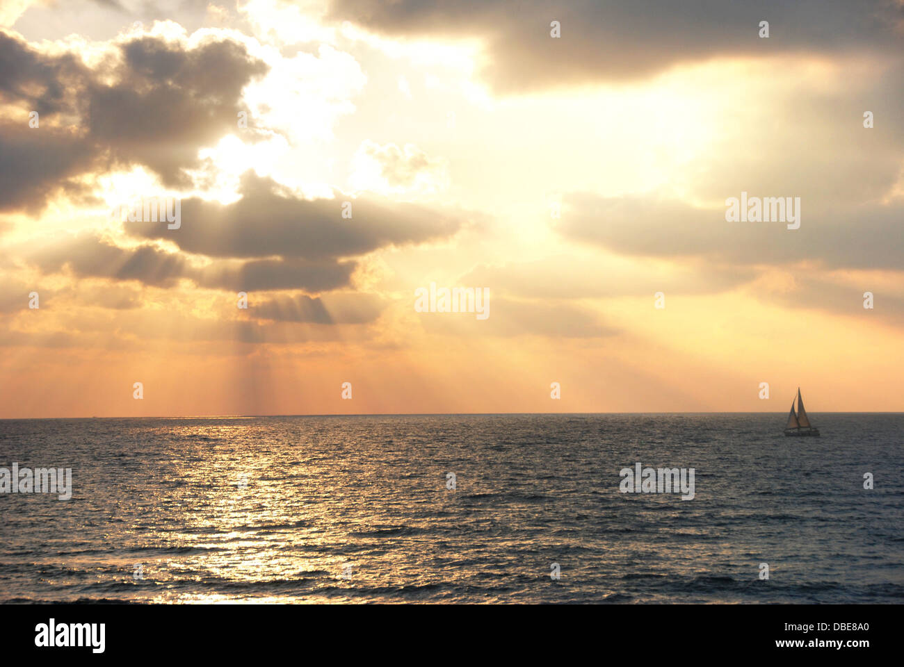 A sailboat sails on the Mediterranean sea in Tel Aviv, Yafo, Jaffo ...
