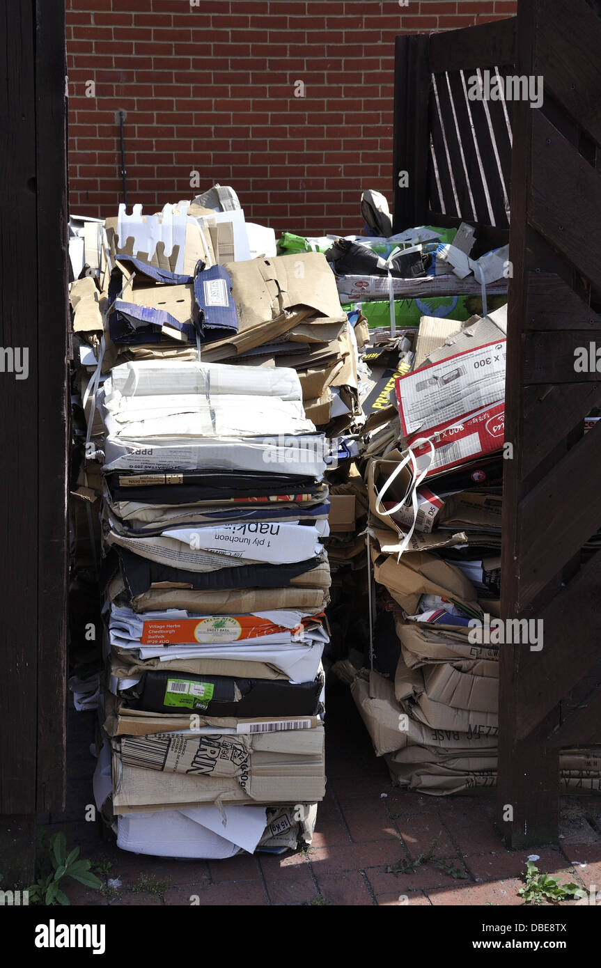 Cardboard and paper recycling storage area Stock Photo - Alamy
