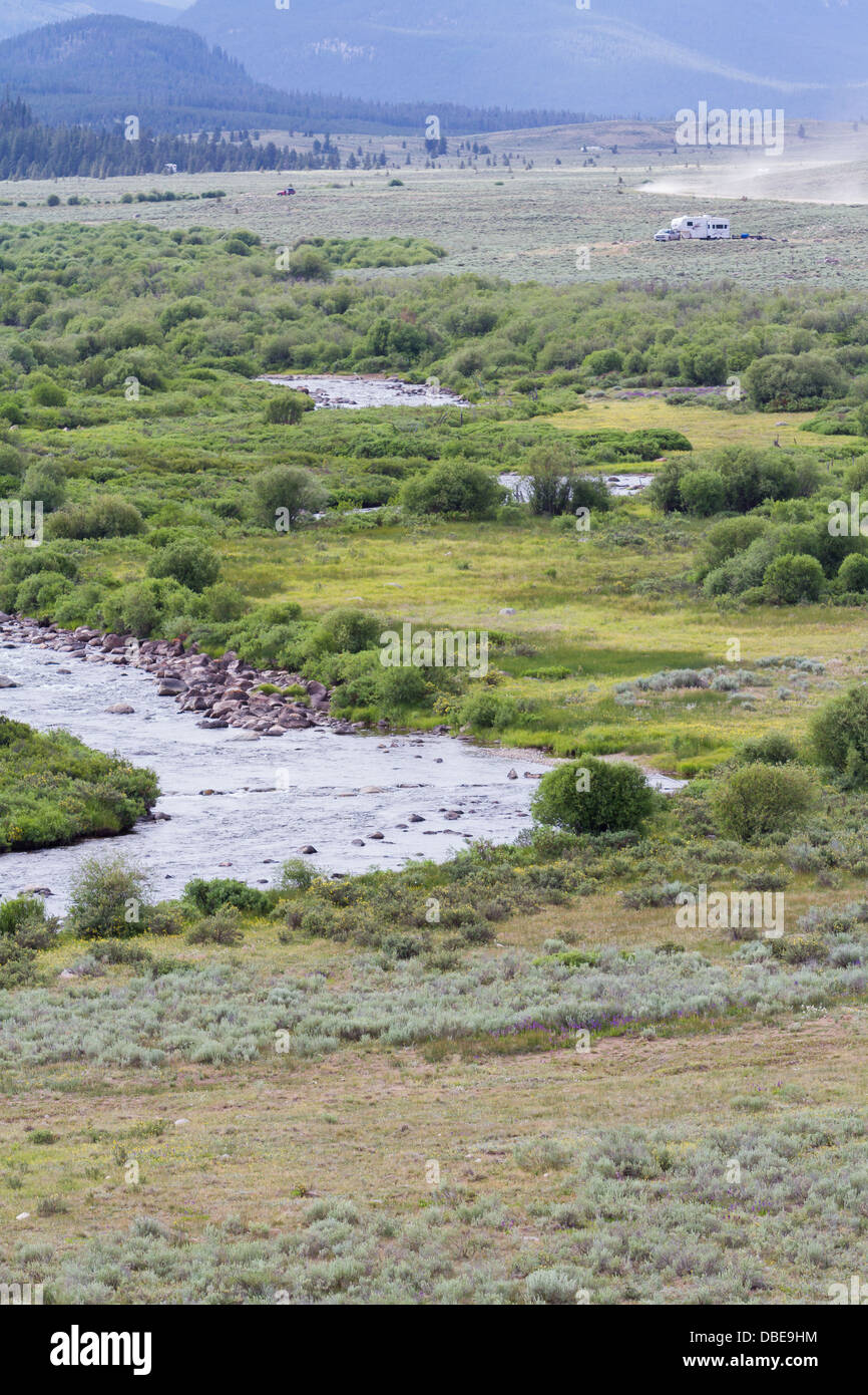 Small valley with river in Colorado Rockies Stock Photo - Alamy
