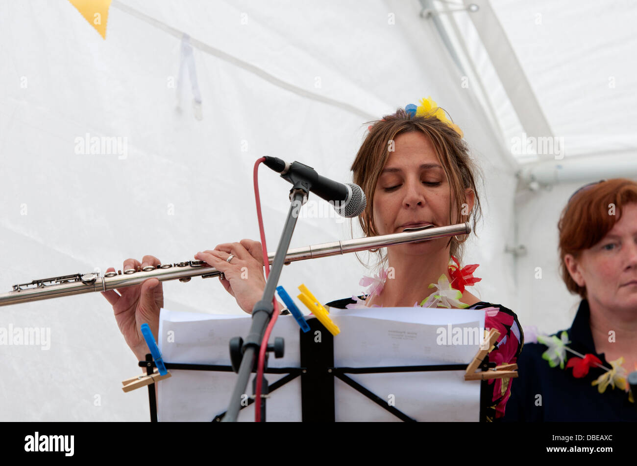 Female playing flute hi-res stock photography and images - Alamy