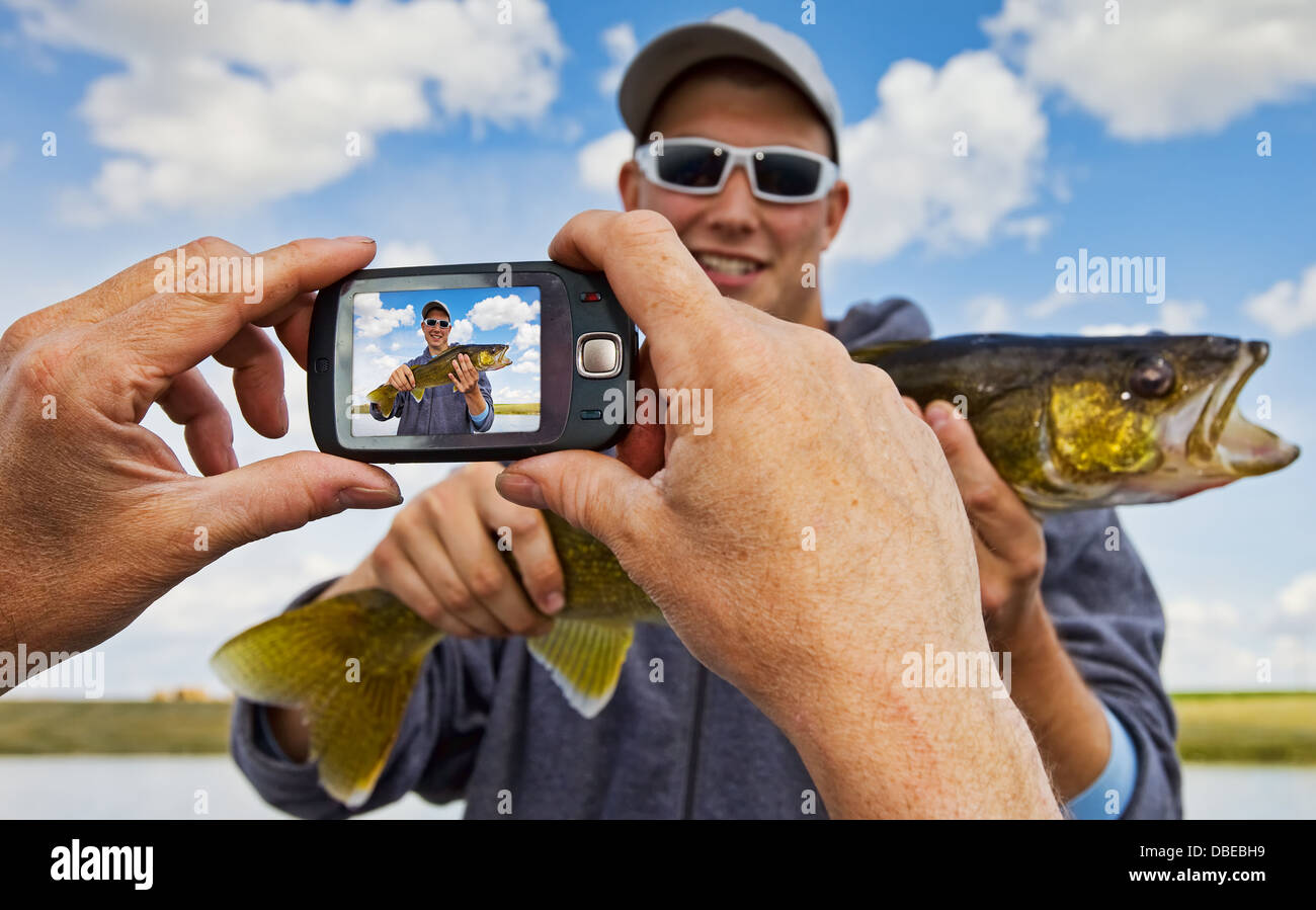 Fish pose catch hi-res stock photography and images - Alamy