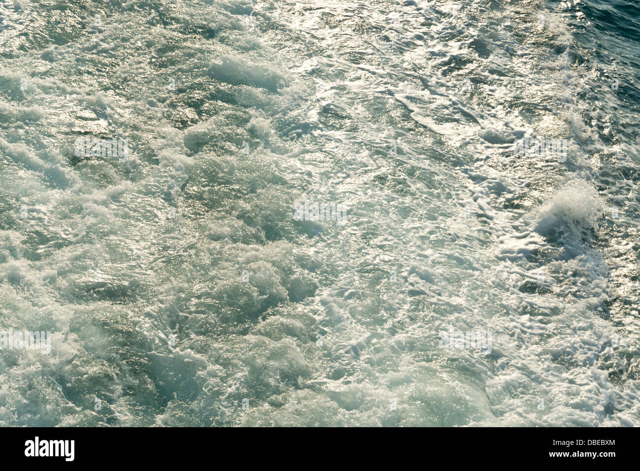 churning water from boat engine wash Stock Photo - Alamy