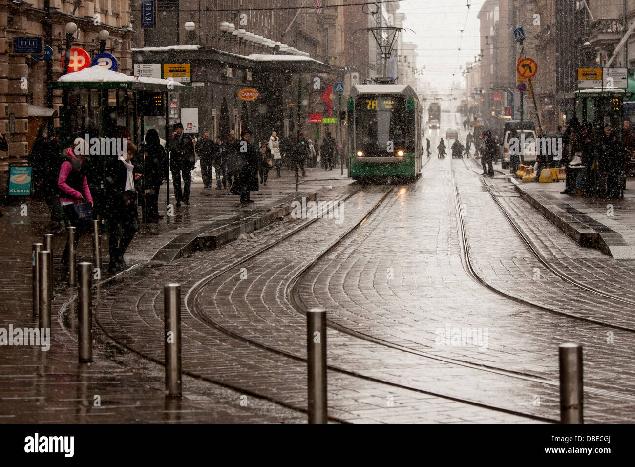 Tram in the city center of Helsinki, Finland - Winter urban scene with ...