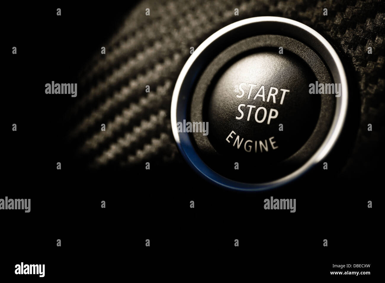 Detail on the start button in a car Stock Photo - Alamy