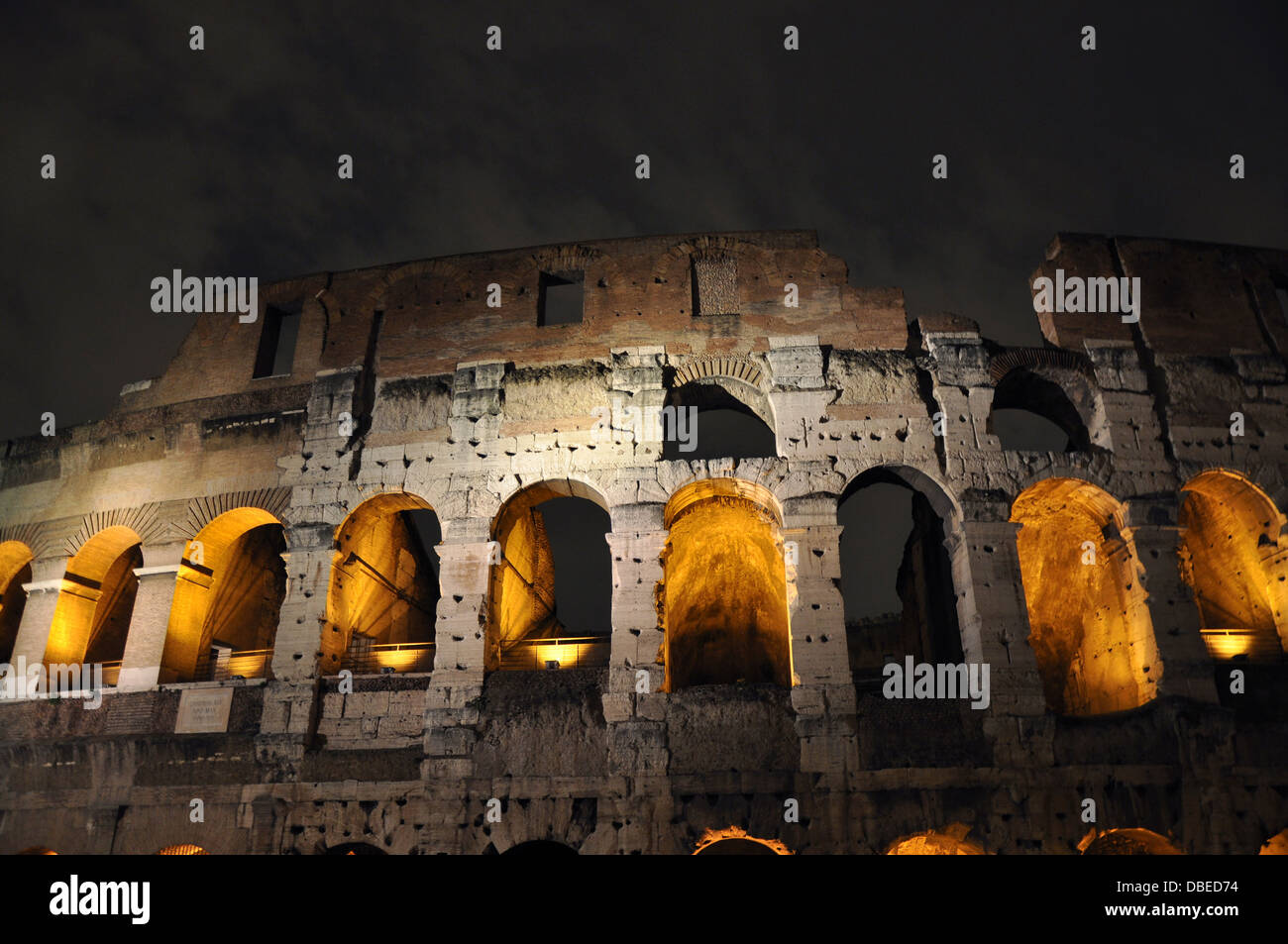 Illuminated Colosseum at night Stock Photo - Alamy