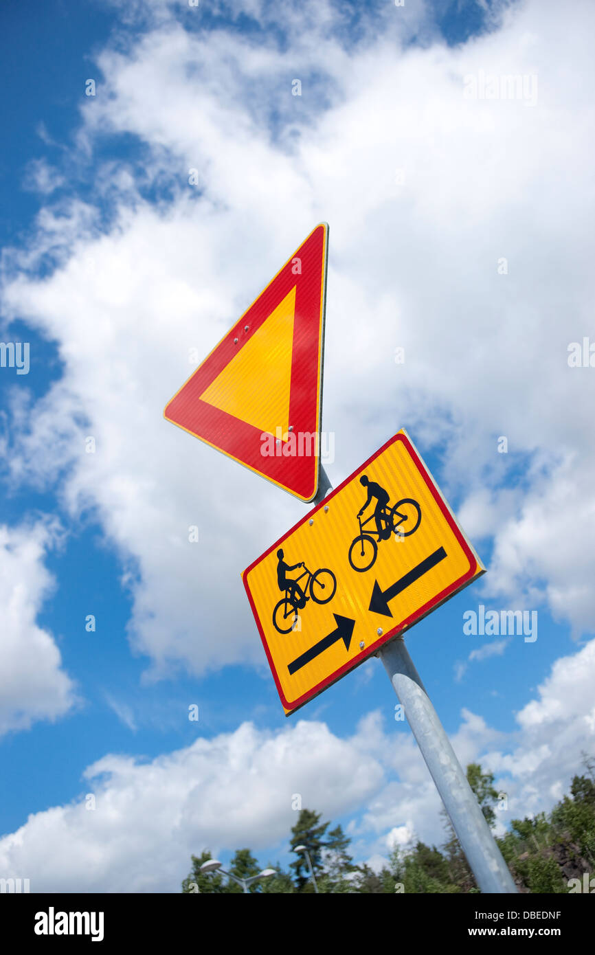 Give way Two-way cycle track sign, Helsinki Stock Photo - Alamy