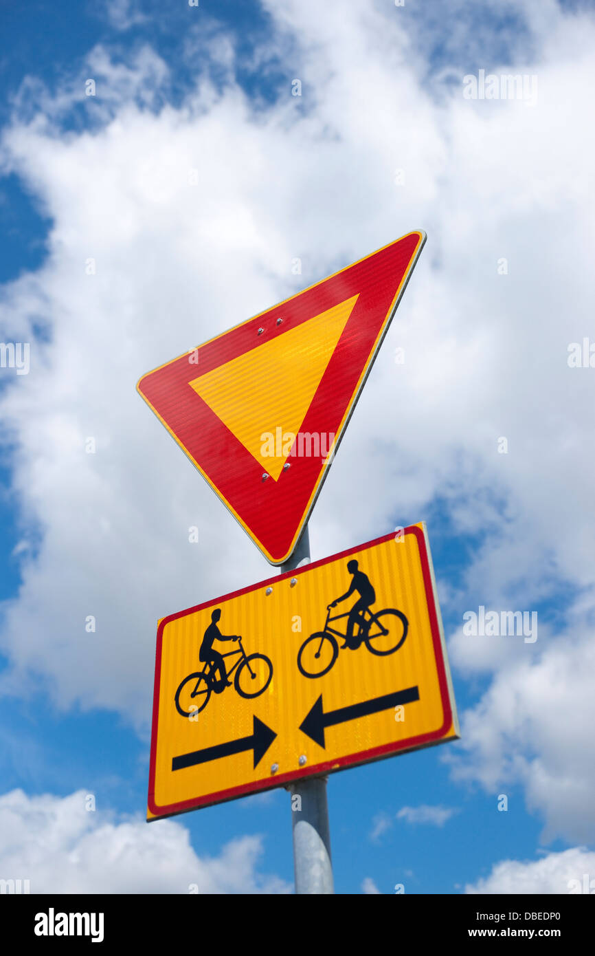 Give way Two-way cycle track sign, Helsinki Stock Photo - Alamy