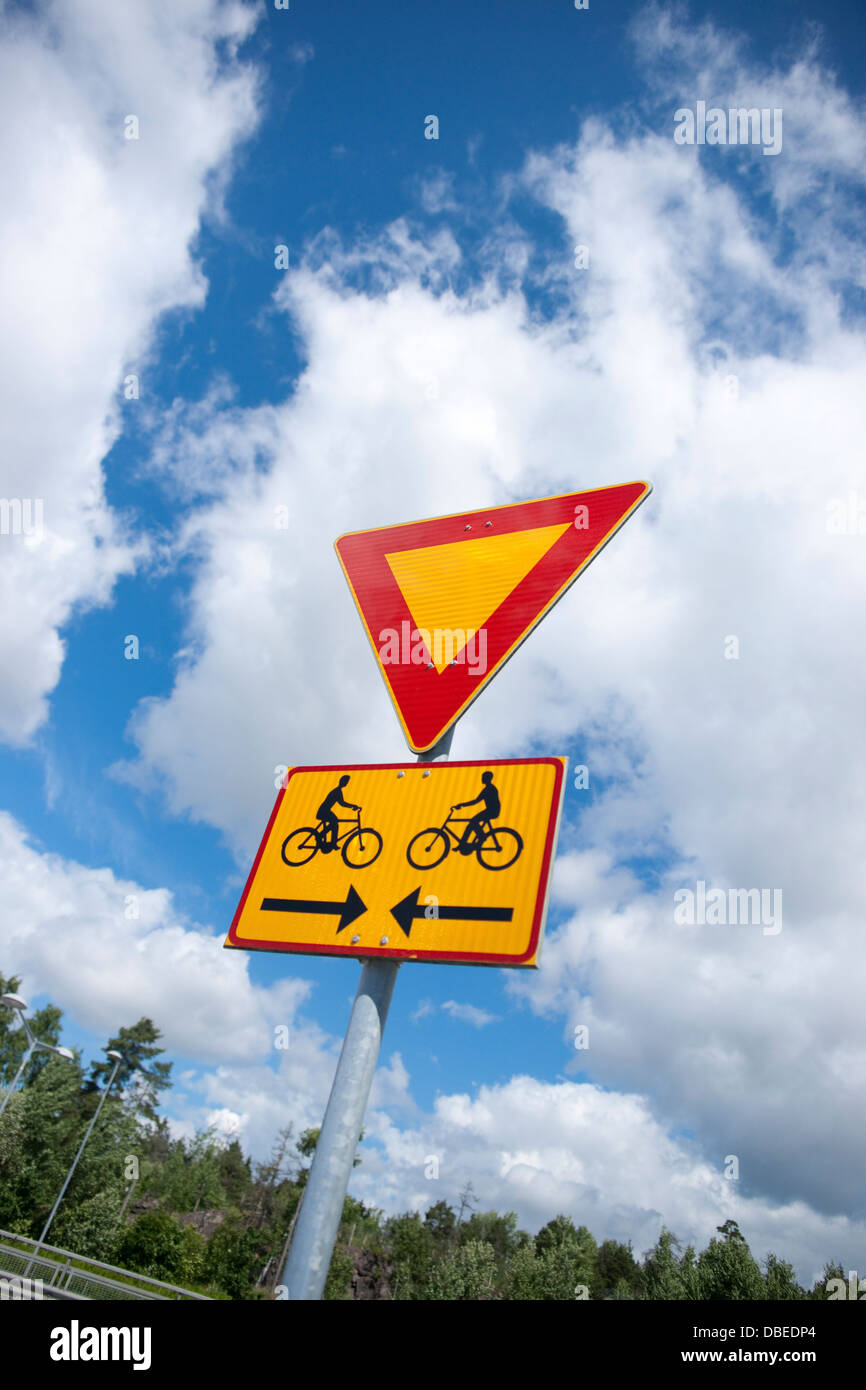 Give way Two-way cycle track sign, Helsinki Stock Photo - Alamy